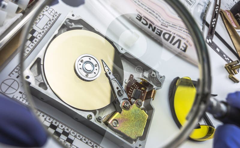 Police Expert Examines Hard Drive in Search of Evidence Stock Image ...
