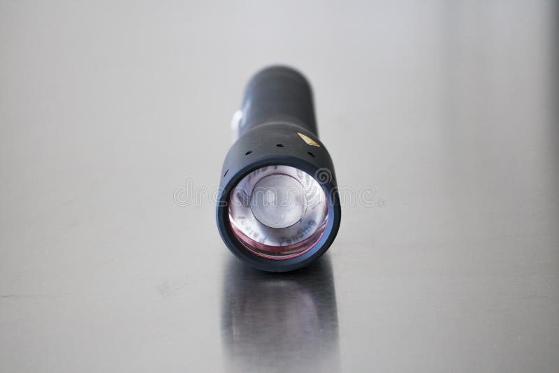 Police Flashlight stock photo. Image of front, lens, flashlight - 82118608