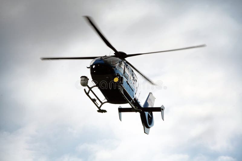 Police Helicopter in Flight Stock Photo - Image of biplane, hovering ...