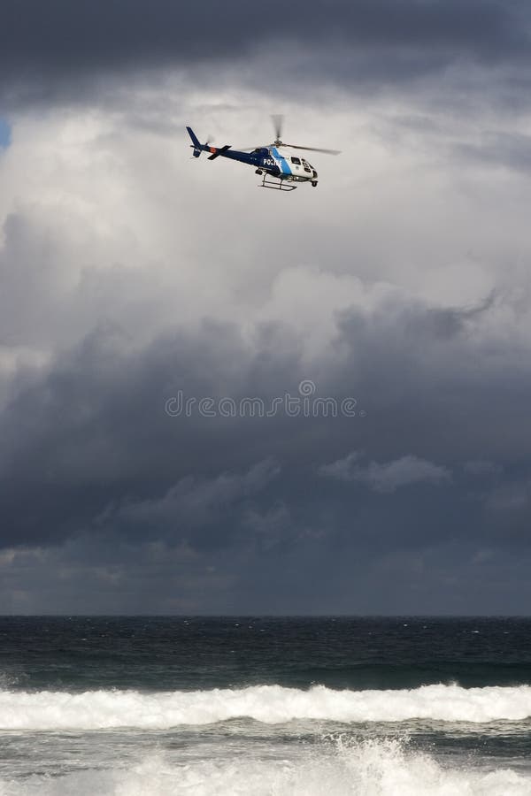 Police Helicopter in Flight Stock Photo - Image of biplane, hovering ...