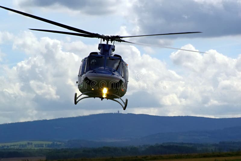 Police Helicopter in Flight Stock Photo - Image of biplane, hovering ...