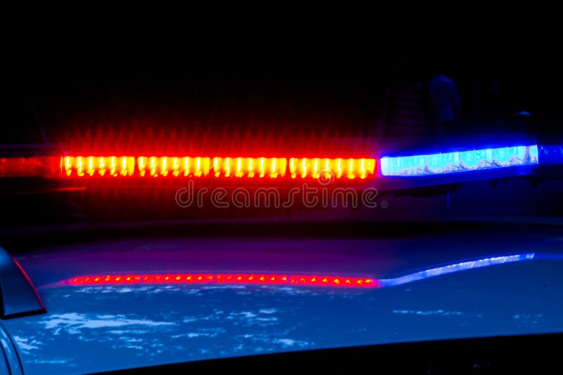 Police Lights Flashing on the To of Car Stock Image - Image of ...