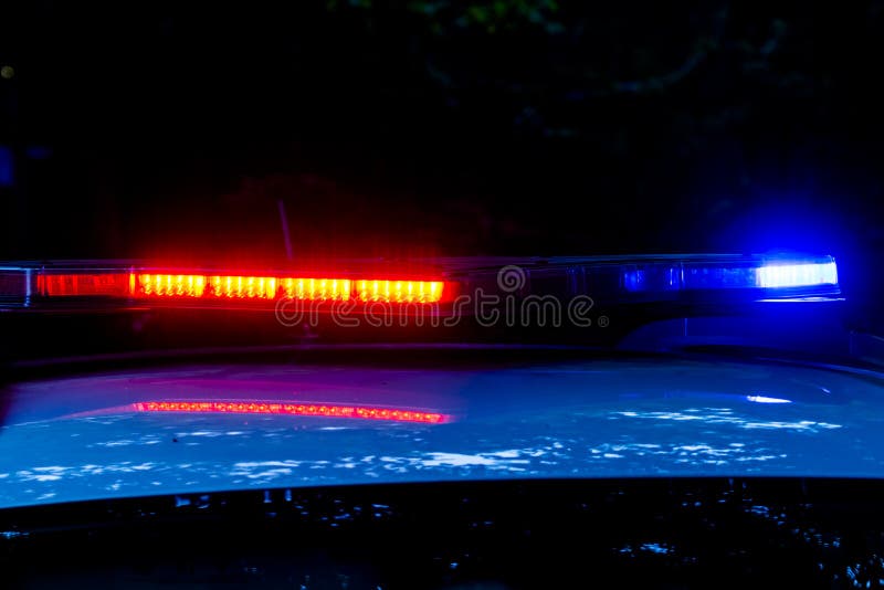 Police Lights Flashing on the To of Car Stock Photo - Image of ...