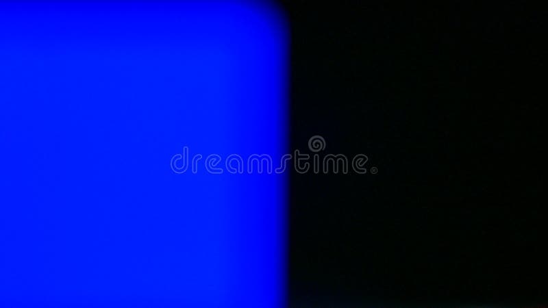 Blue Flashes of Light Defocused Screen Overlay on a Black Background ...