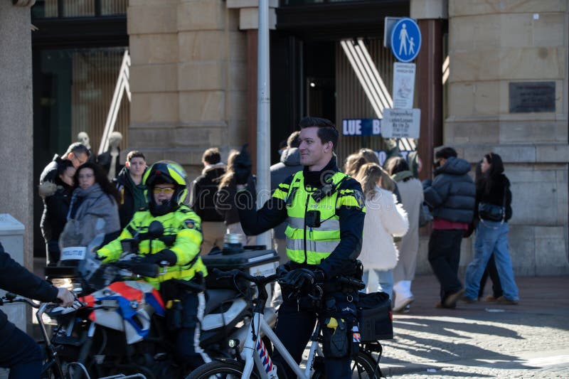 Police Man on Bicycle at Amsterdam the Netherlands 17-3-2025 Editorial ...