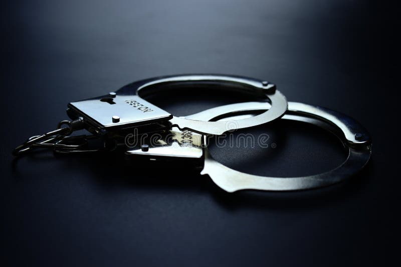 Police Metal Handcuffs on Black Background, Close-up, Selective Focus ...