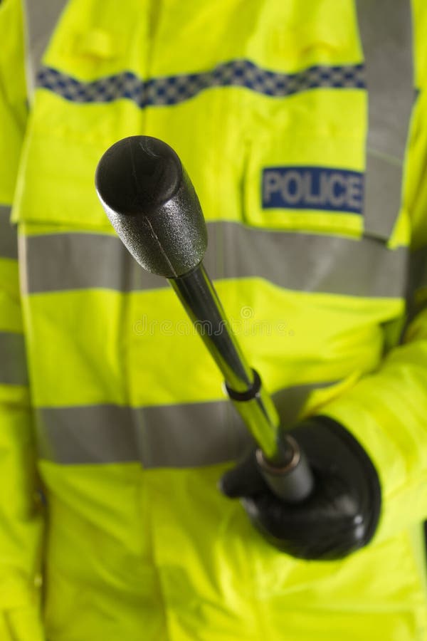 Police officer with baton stock image. Image of pointing - 21801367
