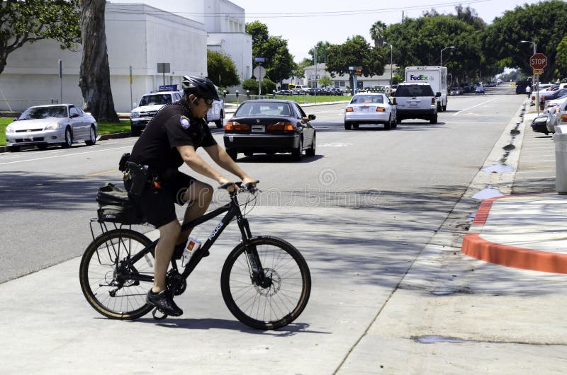 Police officer on bike editorial stock photo. Image of officer - 43287583