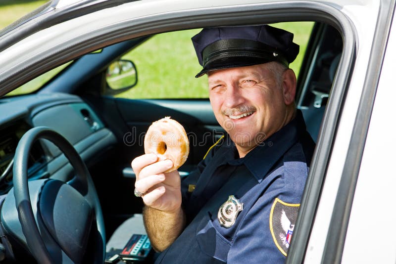 Police Officer and Doughnut Stock Image - Image of middle, policeman ...