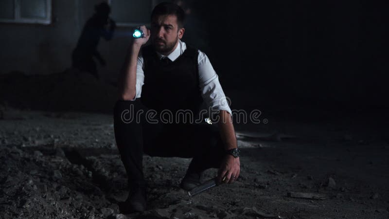 Policeman finding evidence stock video. Video of mission - 101901185