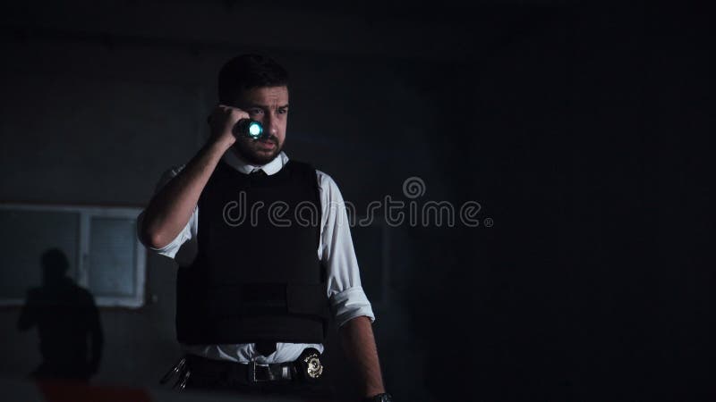 Policeman finding evidence stock video. Video of mission - 101901185