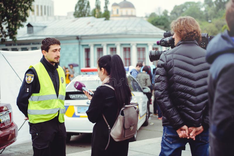 Police Officer Gives an Interview Editorial Stock Image - Image of ...