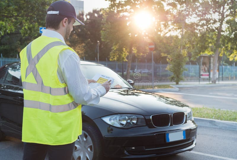 Police Officer Giving a Fine for Parking Violation Stock Photo - Image ...