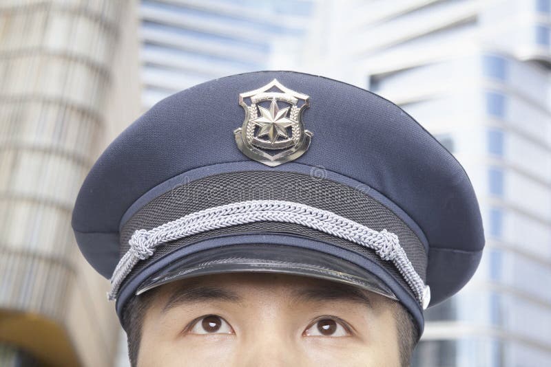 Police Officer, Half Face, Looking Up Stock Photo - Image of building ...