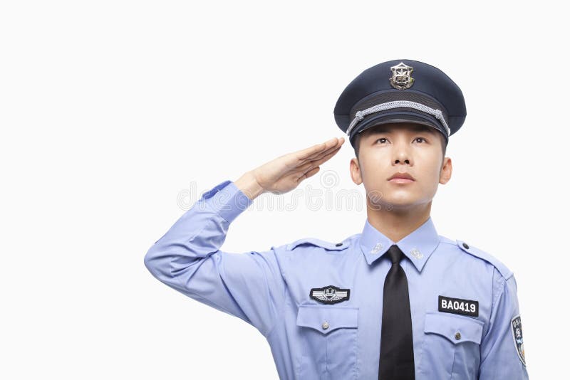 Police Officer Saluting, Studio Shot Stock Image - Image of standing ...