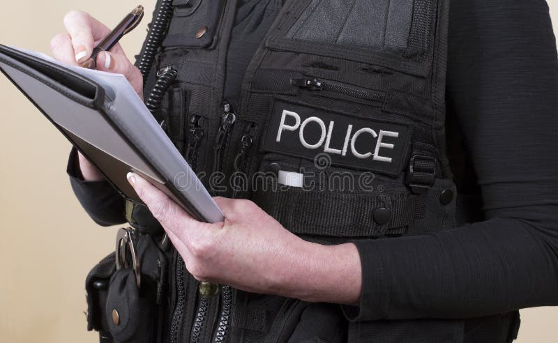 Police Officer Taking Notes Stock Image - Image of enforcement, taking ...