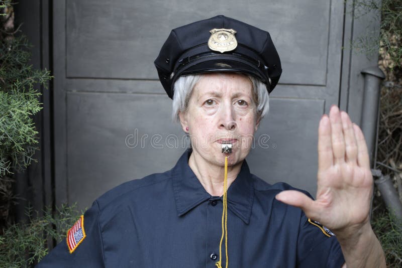 Police Officer Using a Whistle Stock Photo - Image of forbidden, people ...