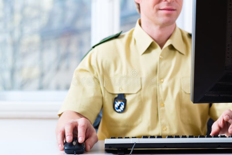 Police Officer Working on Desk in Department Stock Photo - Image of ...