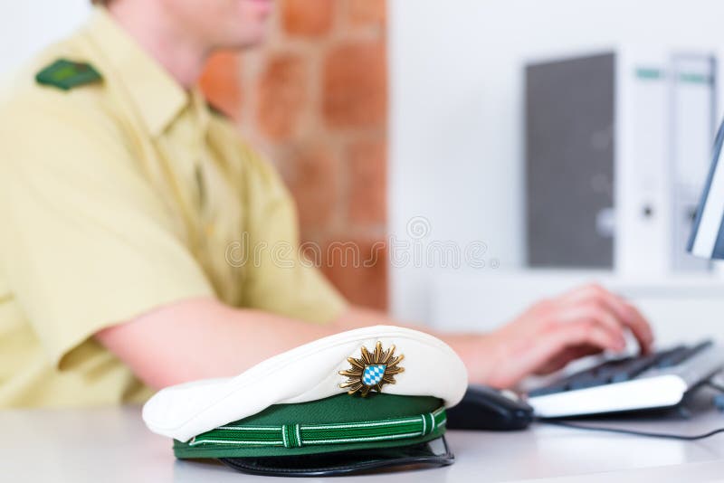 Police Officer Working on Desk in Station Stock Photo - Image of edit ...