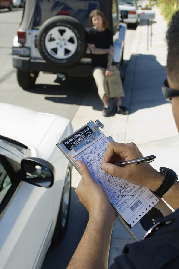 Police - Writing Ticket stock image. Image of automobile - 5095363