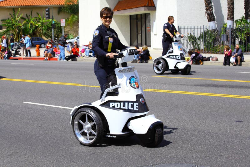 Police Officers on Three-Wheel Segways Editorial Image - Image of ride ...