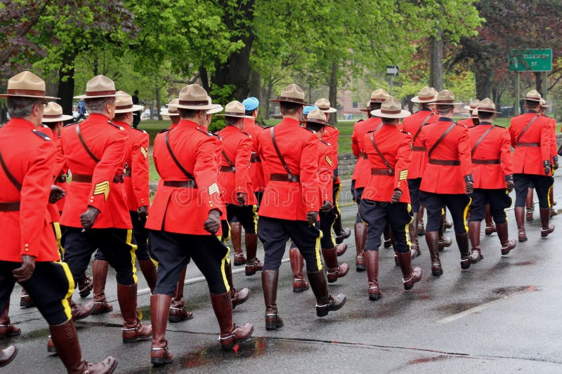 Police in Red RCMP Uniforms March in a Parade Editorial Image - Image ...