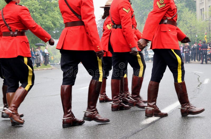 Police in Red RCMP Uniforms March in a Parade Editorial Photography ...