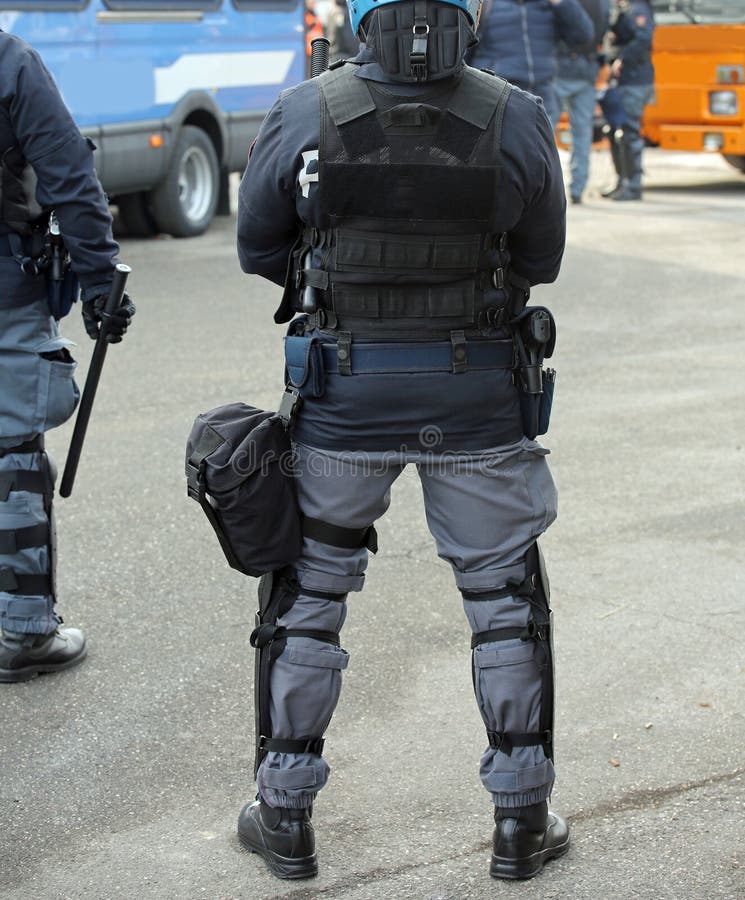 Police in Riot Gear with Batons during a Protest I Stock Image - Image ...