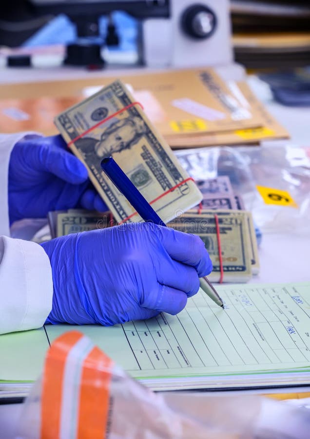Police Scientist Notes Down Serial Numbers of U.S Stock Image - Image ...