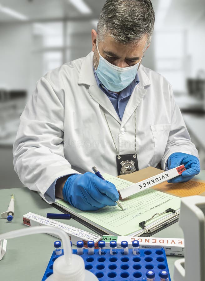 Police Scientist Takes Data From Evidence Box In Crime Lab Stock Photo ...