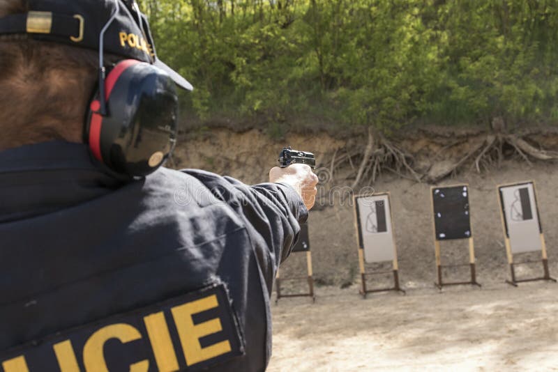 Police shooting stock photo. Image of policeman, competition - 147757560
