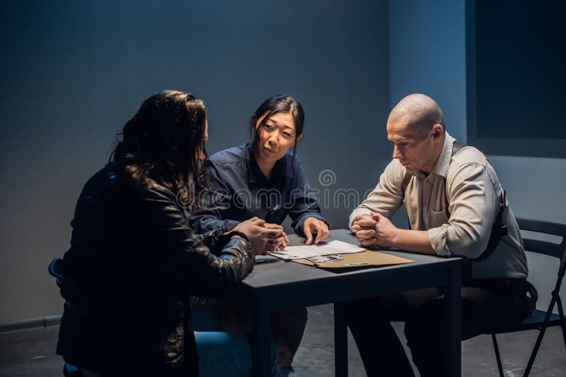 Interrogation of the Suspect. Serious Cop. Sliding Stock Image - Image ...