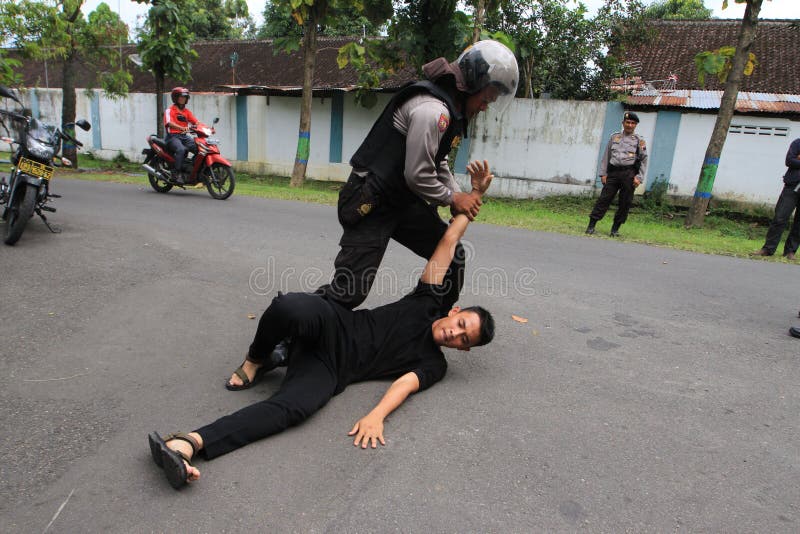 Police editorial photography. Image of catch, indonesia - 51144242