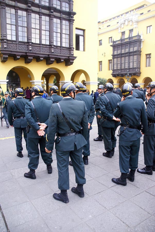 Police watching a parade editorial photo. Image of peru - 244785636