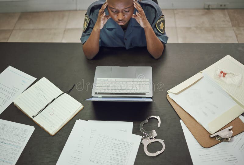 Police, Woman and Working with Stress at Desk with Documents, Paperwork ...