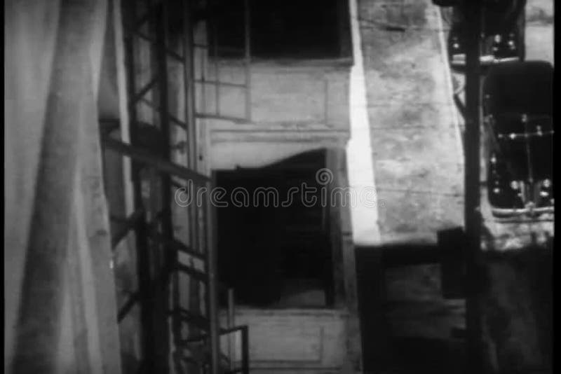 Policeman Chasing Criminal Down Side of Building Stock Footage - Video ...