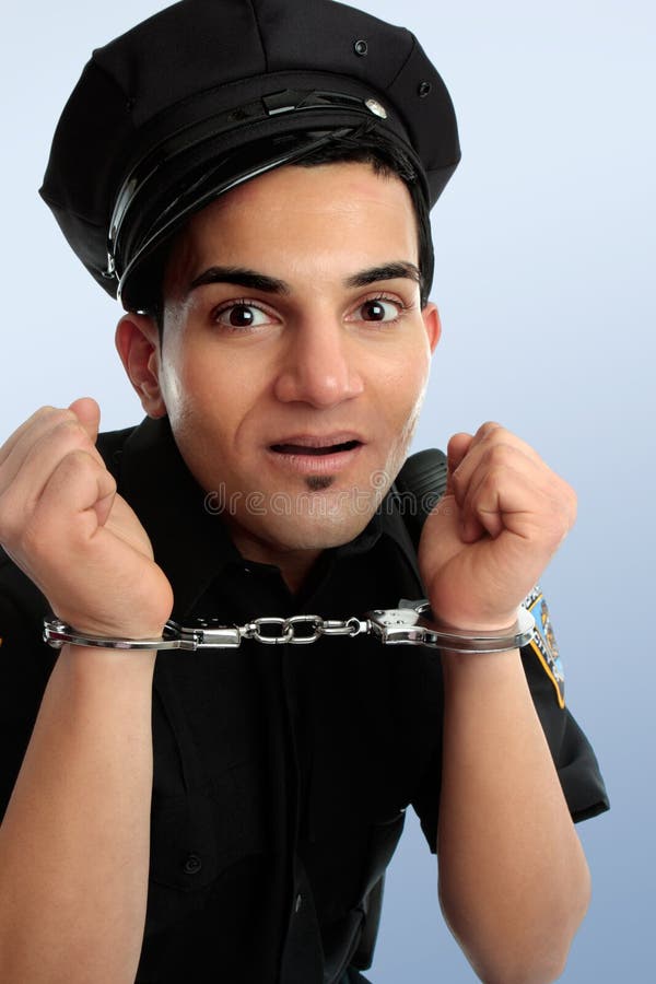 Policeman with handcuffs stock photo. Image of professional - 20822946