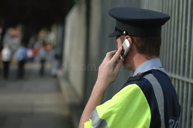 Policeman with the radio stock photo. Image of peace, back - 2351484