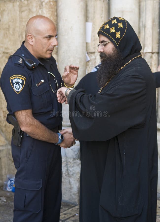 Policeman and priest editorial photography. Image of religious - 25856987