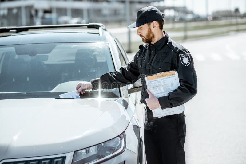 Policeman Putting Fine on the Car Stock Image - Image of policeman ...