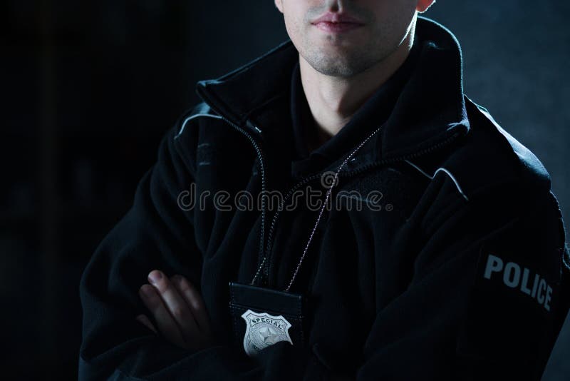 Policeman Standing with Crossed Arms Stock Image - Image of duty, arms ...