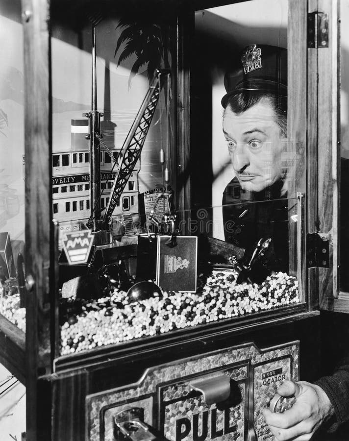 Policeman Trying To Catch a Toy Stock Image - Image of cabinets ...