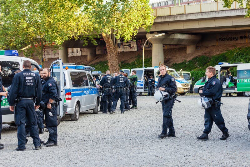 Policemen and Policewomen in an Action in Front of the Cologne ...
