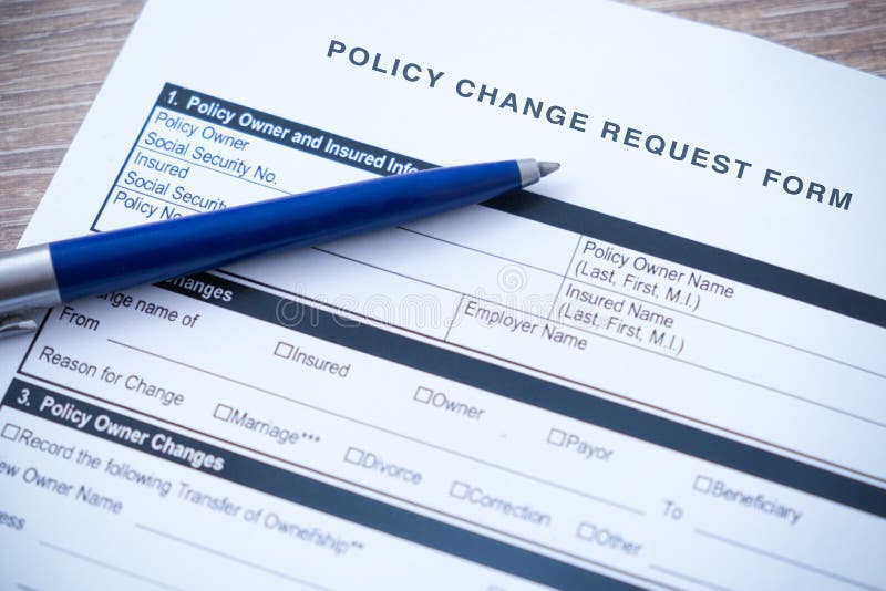 Policy Change Request Form with Blue Pen , Shallow Depth of Focus Field ...