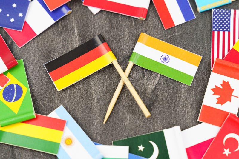 The Concept is Diplomacy. in the Middle among the Various Flags are Two ...