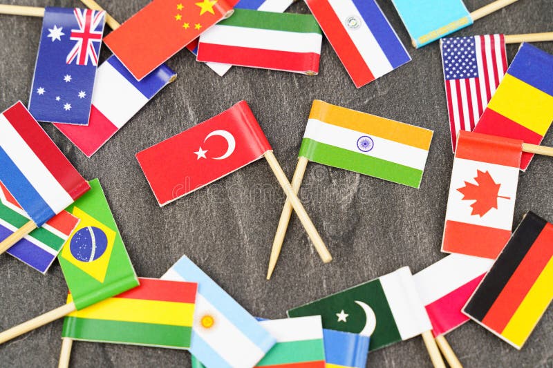 The Concept is Diplomacy. in the Middle among the Various Flags are Two ...