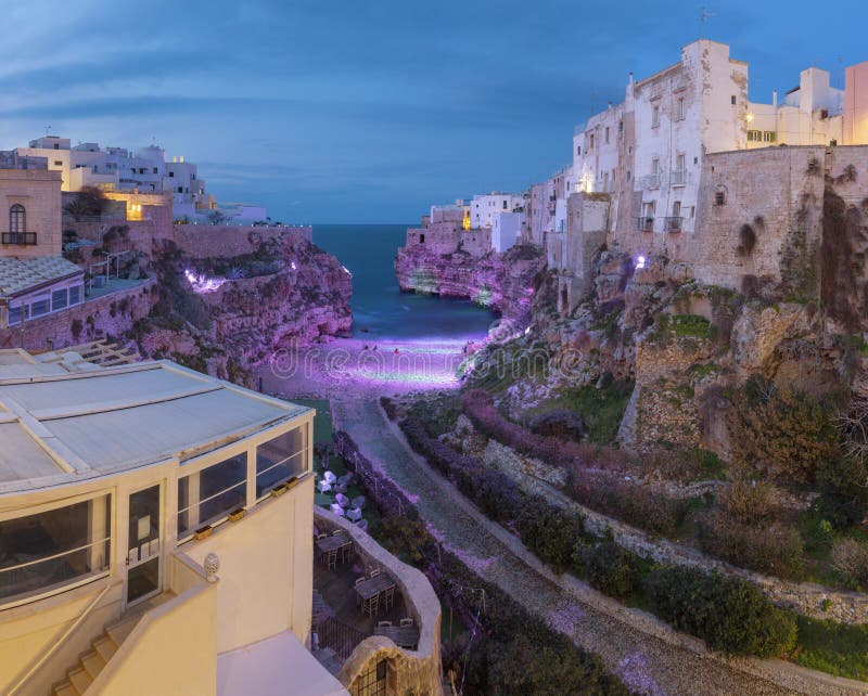 Polignano a Mare - the Town Over the Clifs at Dusk Stock Photo - Image ...