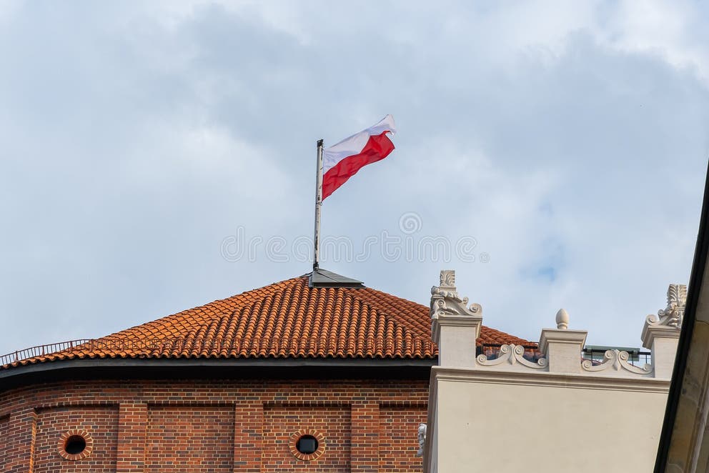 Polish Flag on Top of a Red Brick Building Stock Photo - Image of ...