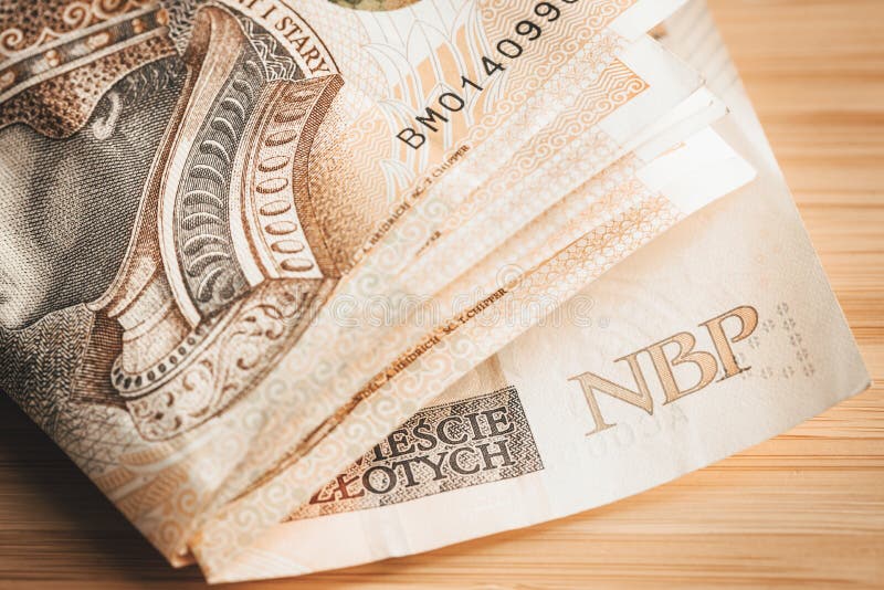 Polish Money, a Bundle of Rolled 200 Zloty Banknotes Lying on the Table ...