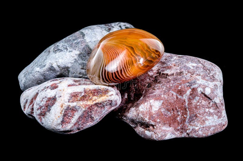 Polished Agate Stone on Rocks Stock Photo - Image of texture, mineral ...